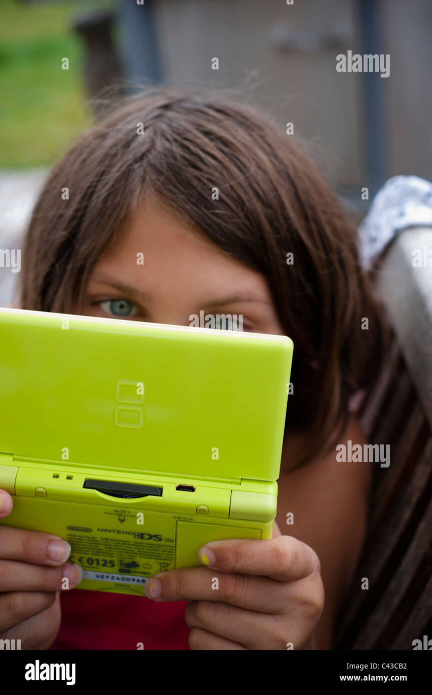 Girl playing nintendo Stock Photo - Alamy