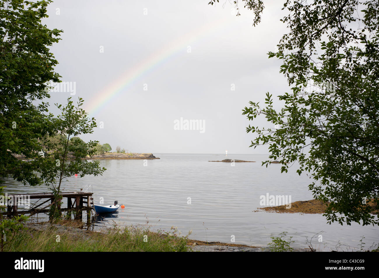Rainbow over Hardangerfjord Stock Photo - Alamy
