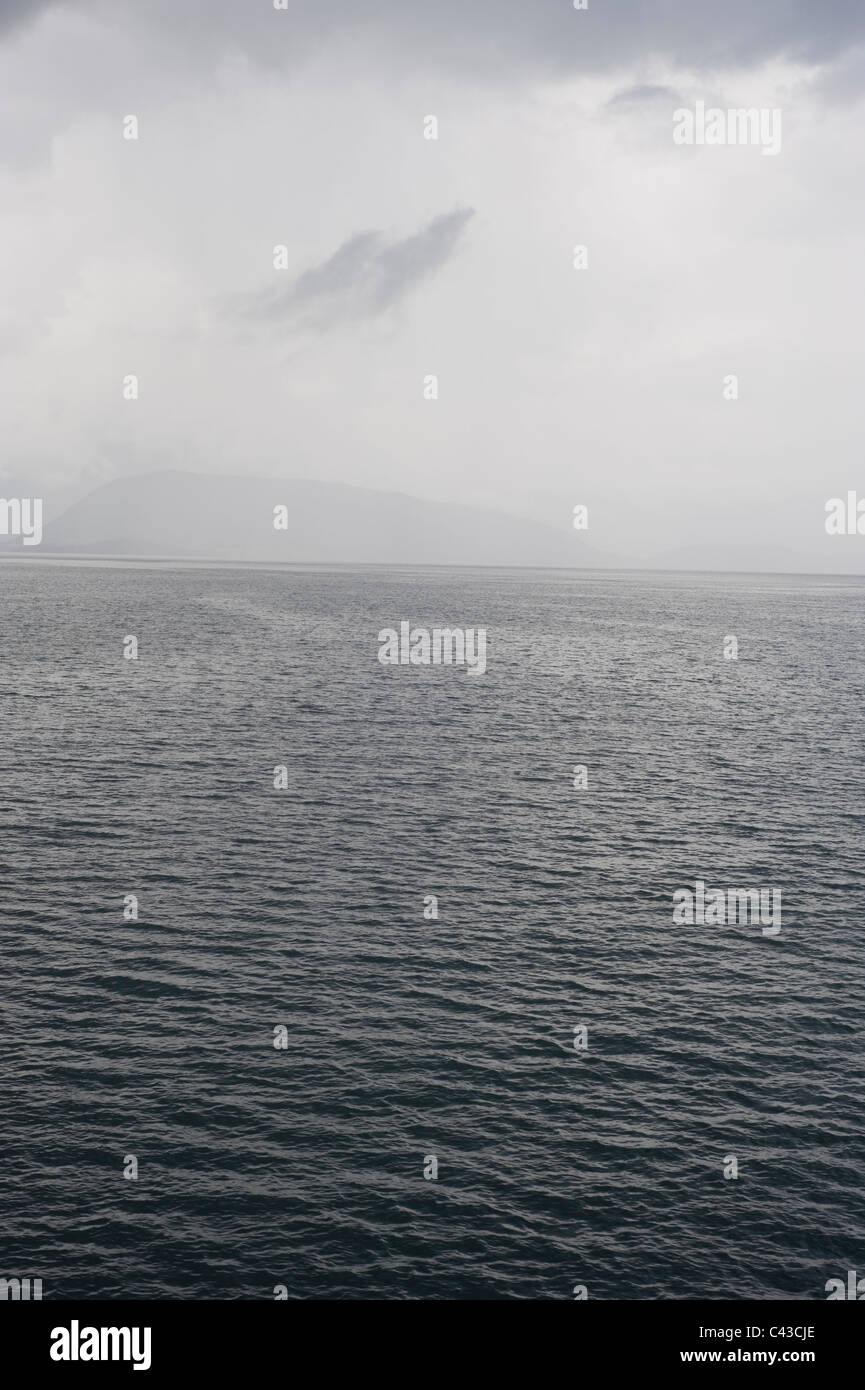 Clouds and mist over sea Stock Photo - Alamy