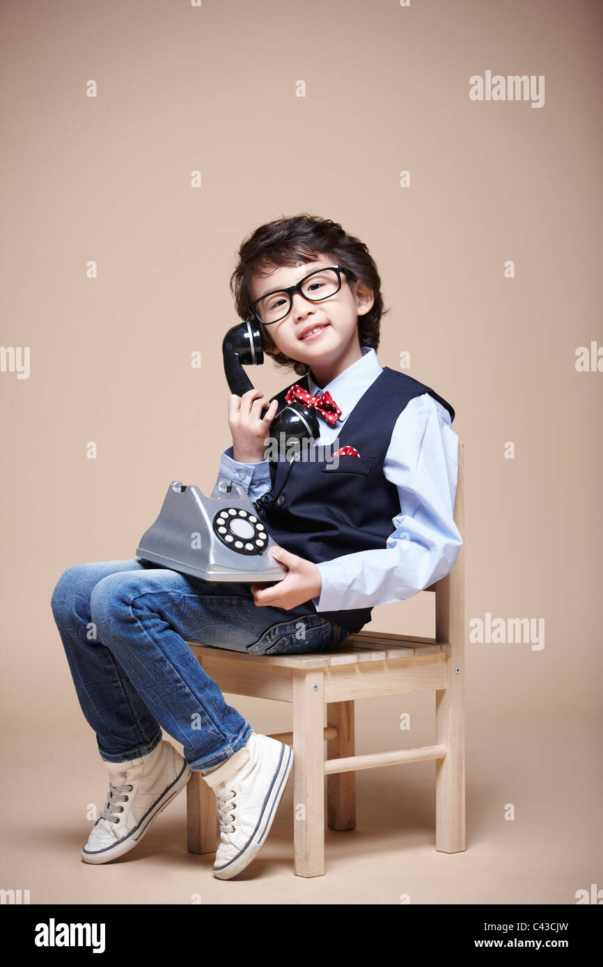 boy answering the phone Stock Photo - Alamy