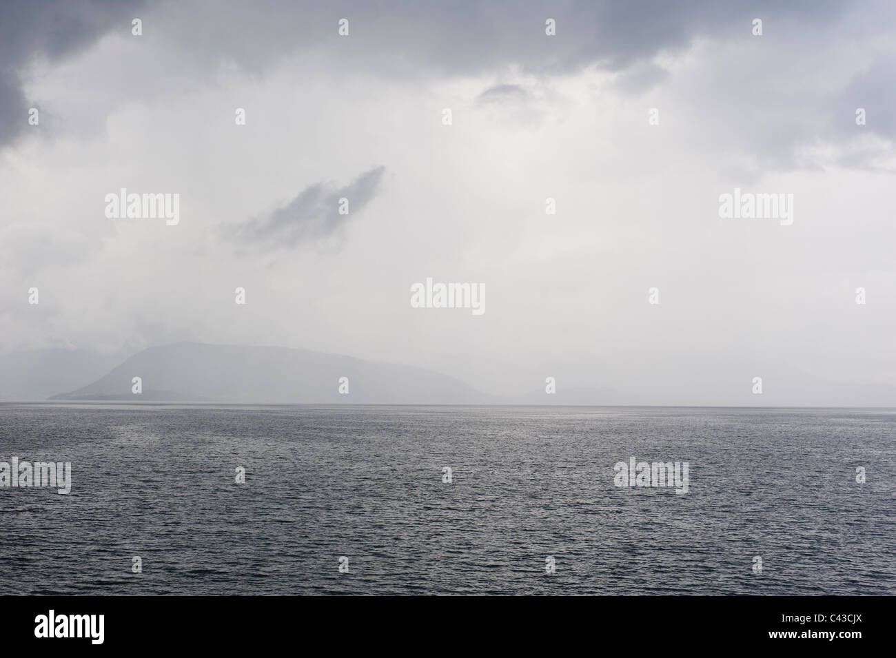 Clouds and mist over sea Stock Photo - Alamy