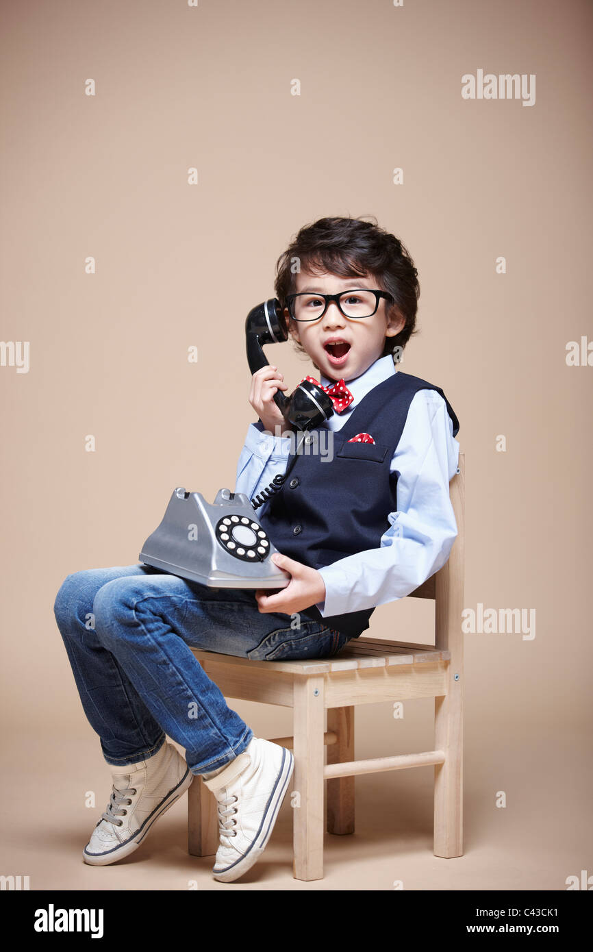 boy answering the phone Stock Photo - Alamy