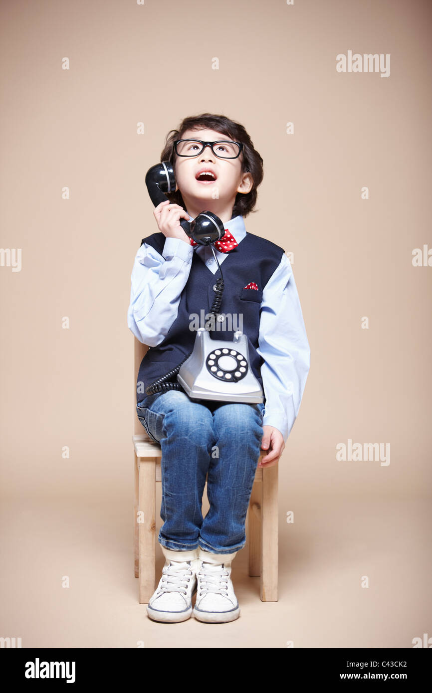 boy answering the phone Stock Photo - Alamy