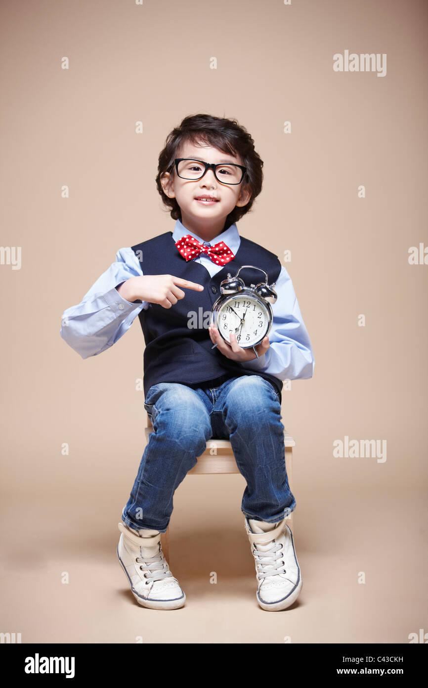 boy pointing at clock Stock Photo - Alamy