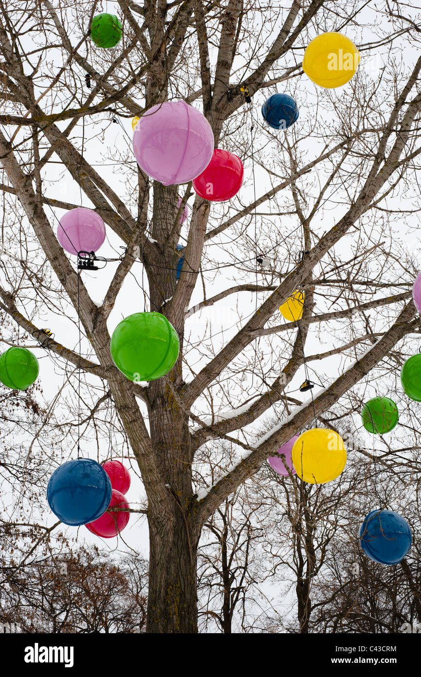 Balloons in tree Stock Photo - Alamy