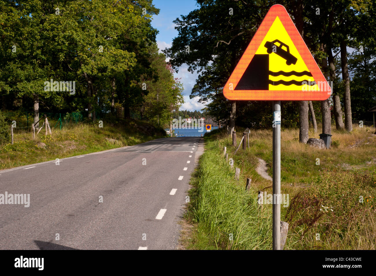 Road sign, quay Stock Photo - Alamy
