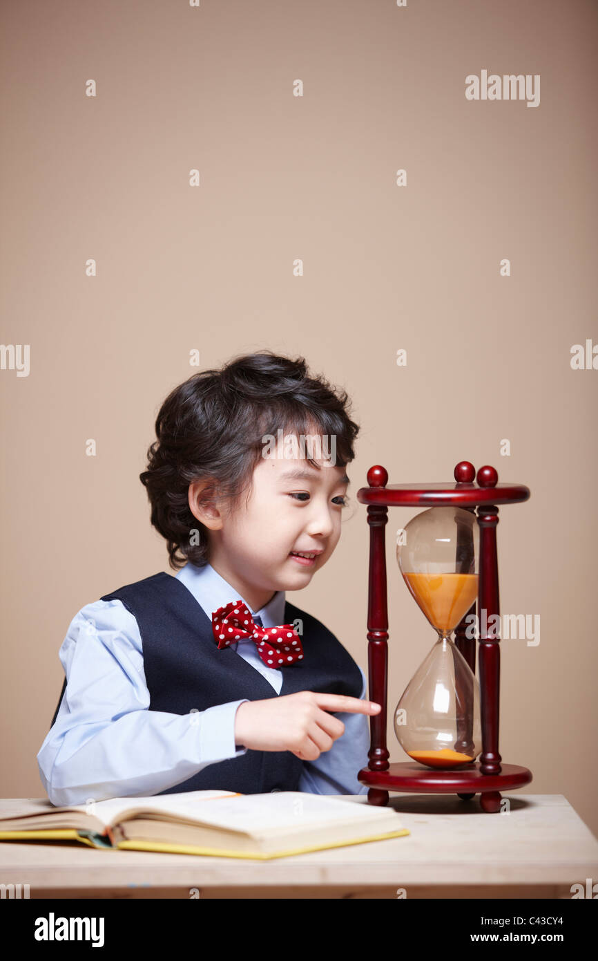 Boy hourglass hi-res stock photography and images - Alamy