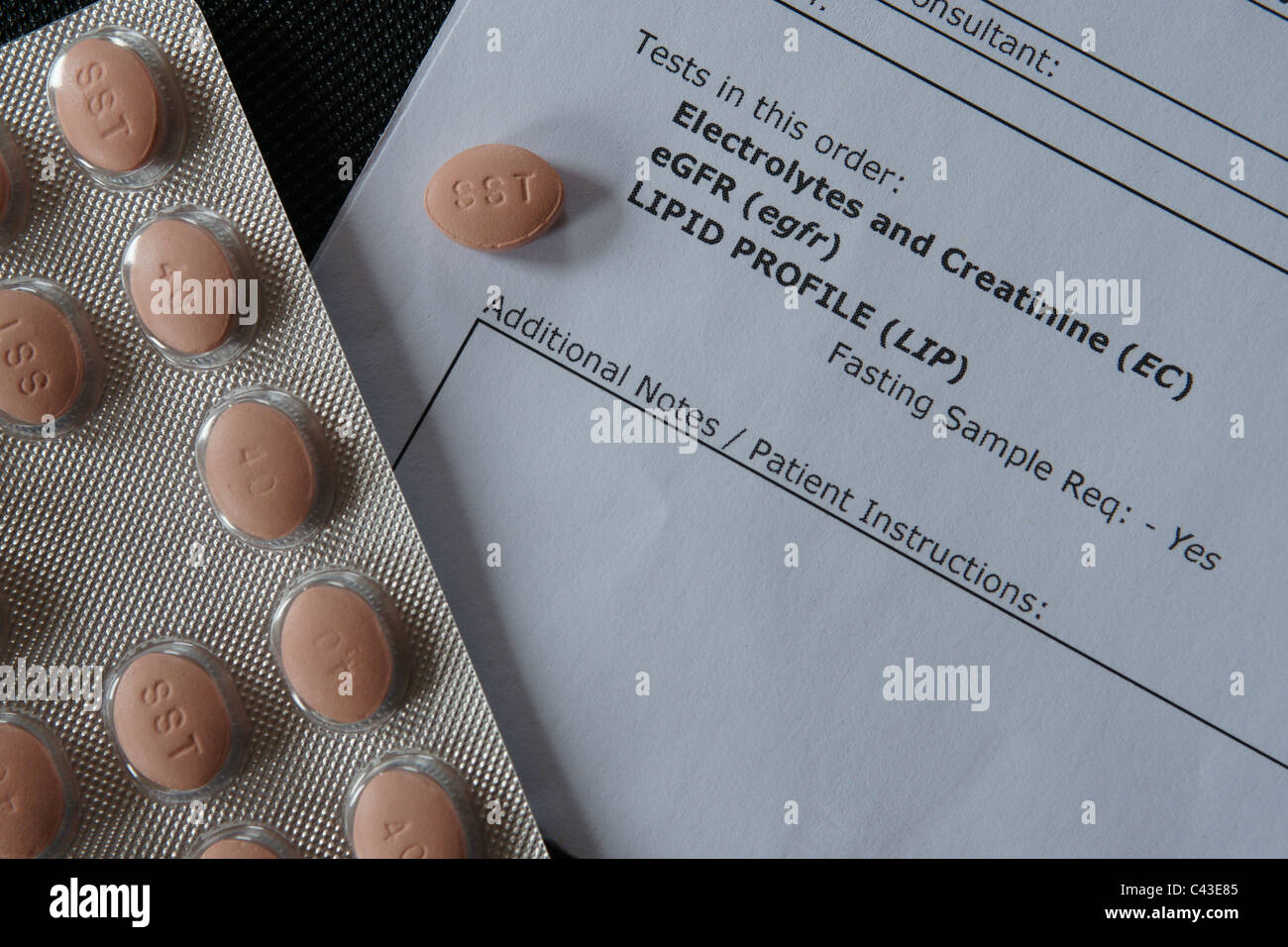 Blood test notification and statin tablets Stock Photo - Alamy
