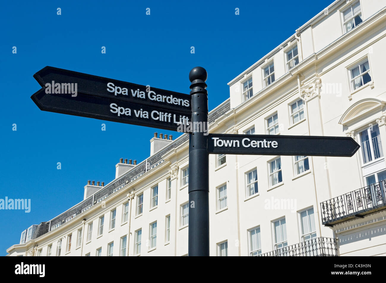 Close up of tourist information signpost sign to cliff lift and town ...