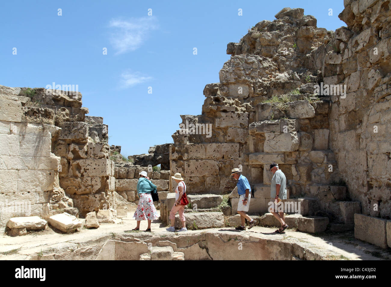 Tourists visit the ancient Roman ruins of Salamis, near Famagusta, in ...