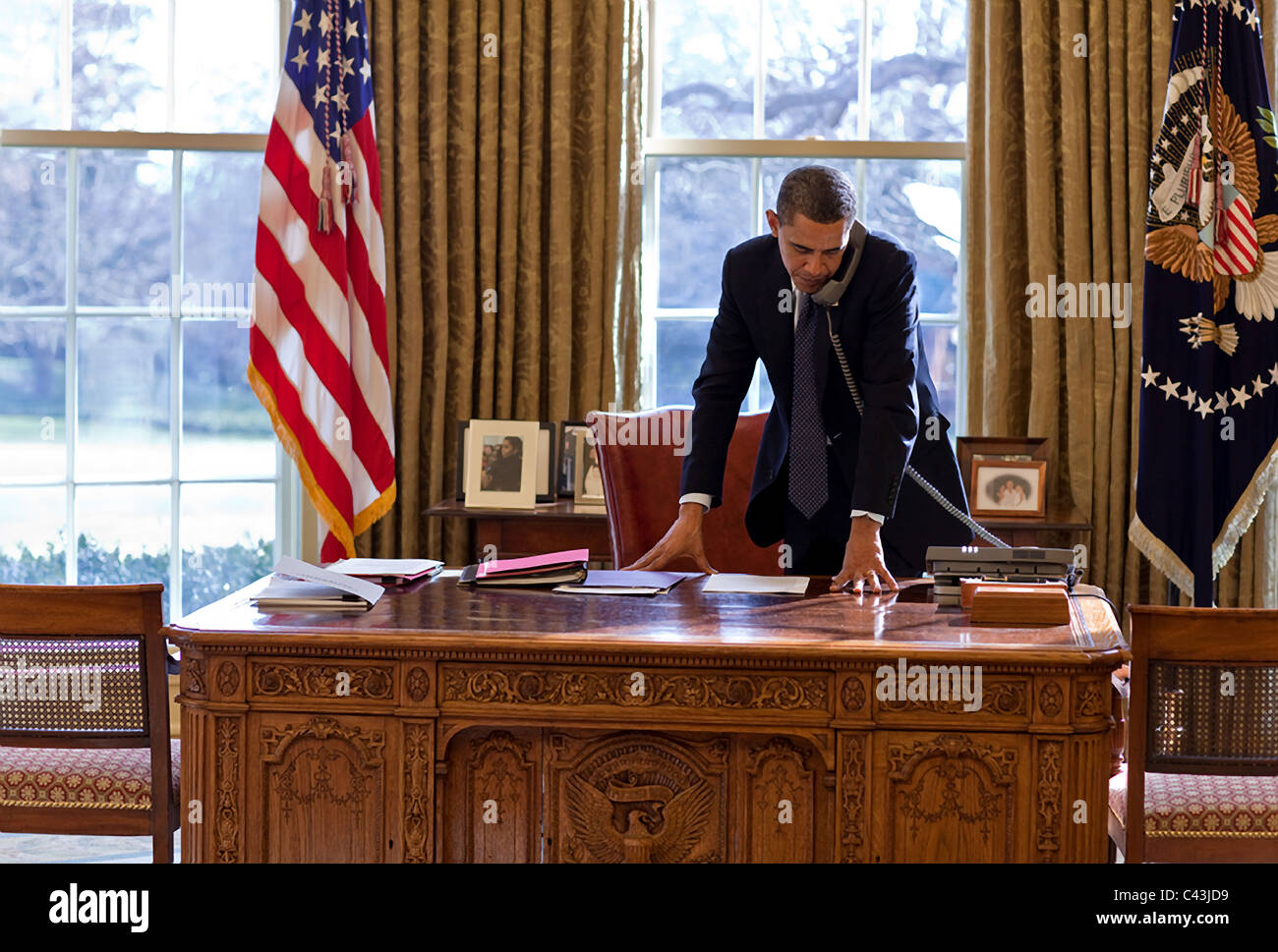 President Barack Obama talks on the phone with Russian President Dmitri ...