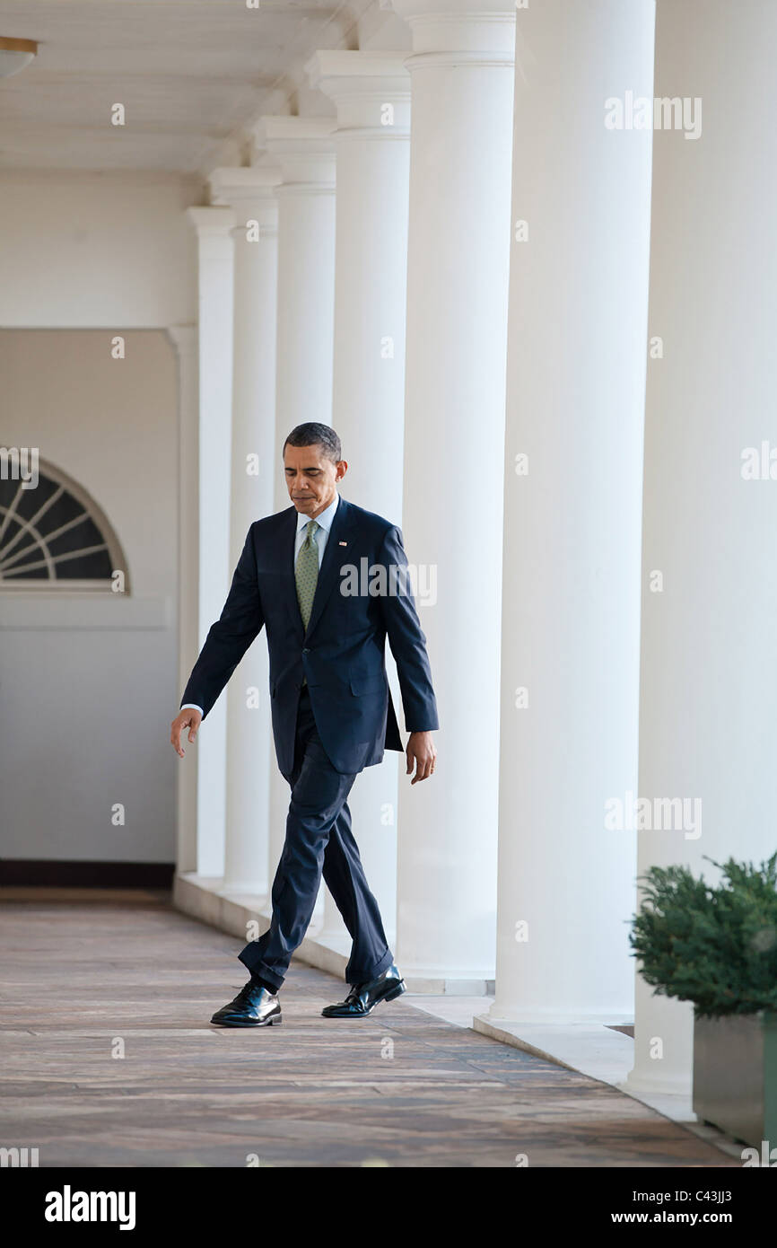 President Barack Obama walks on the Colonnade of the White House Stock ...