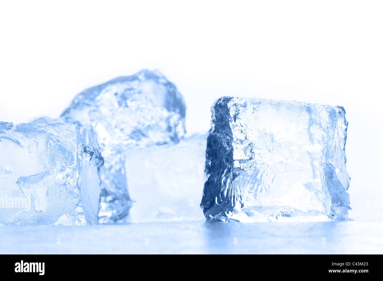 transparent ice cube on the white background Stock Photo - Alamy