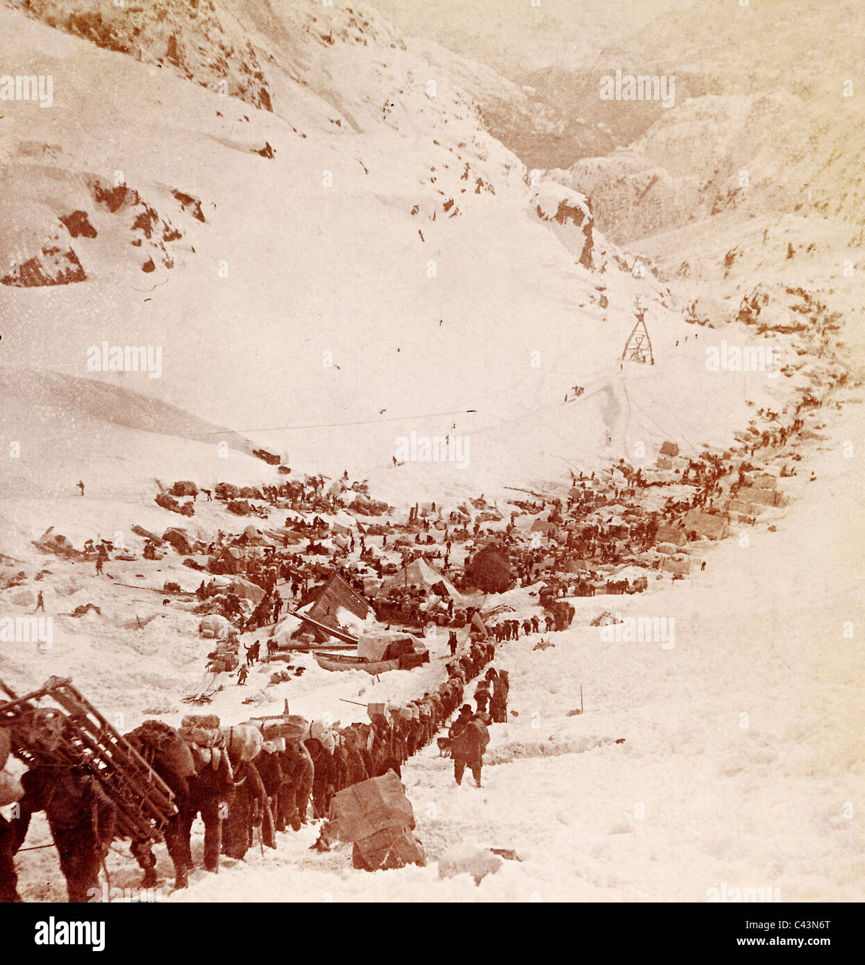 Miners and packers climbing the Golden Stair trail Chilkoot Pass Alaska ...