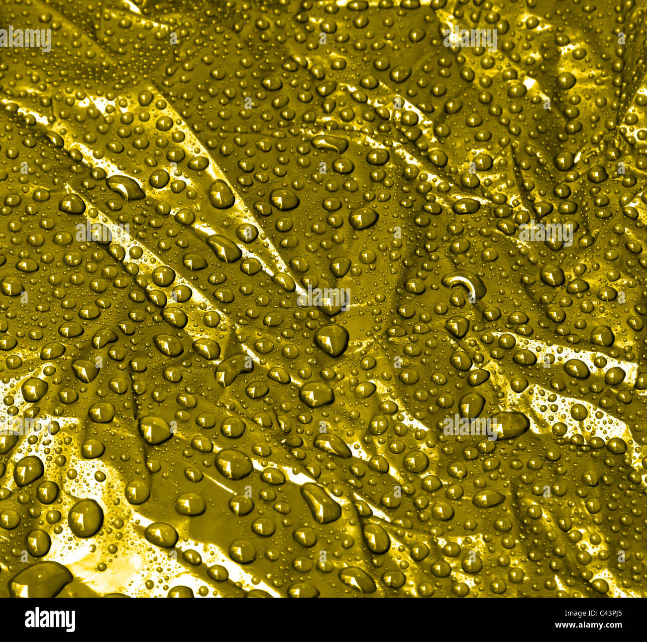 Water droplets on a gold background Stock Photo - Alamy
