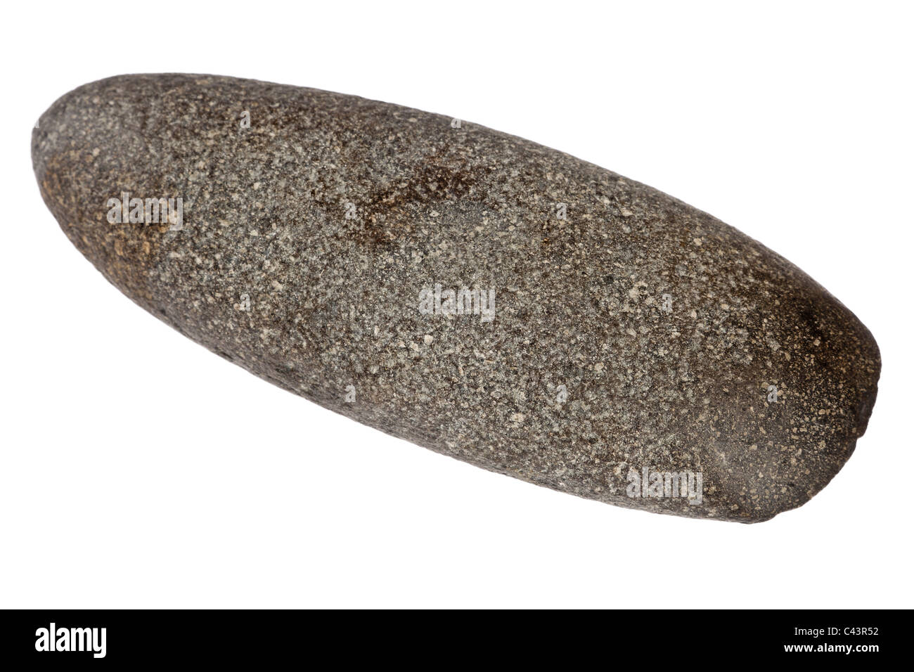Stone age axe head photographed against a pure white background ...