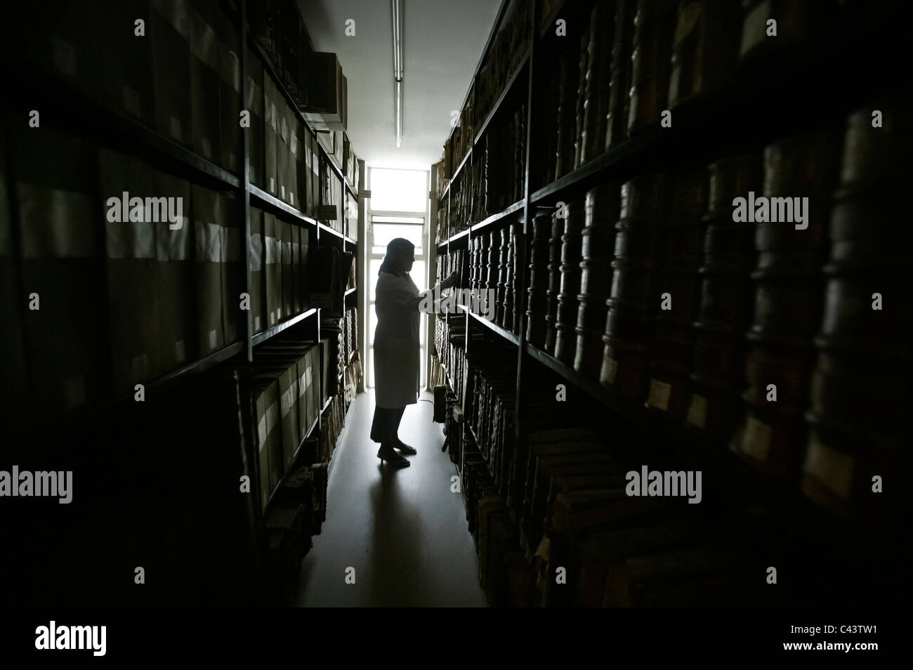 Bookshelf woman silhouette hi-res stock photography and images - Alamy