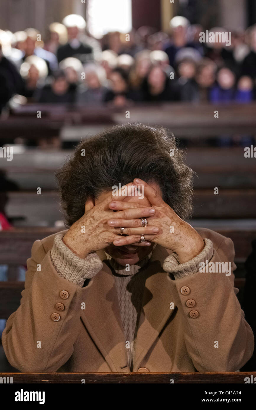 Religious catholic older woman praying hi-res stock photography and ...