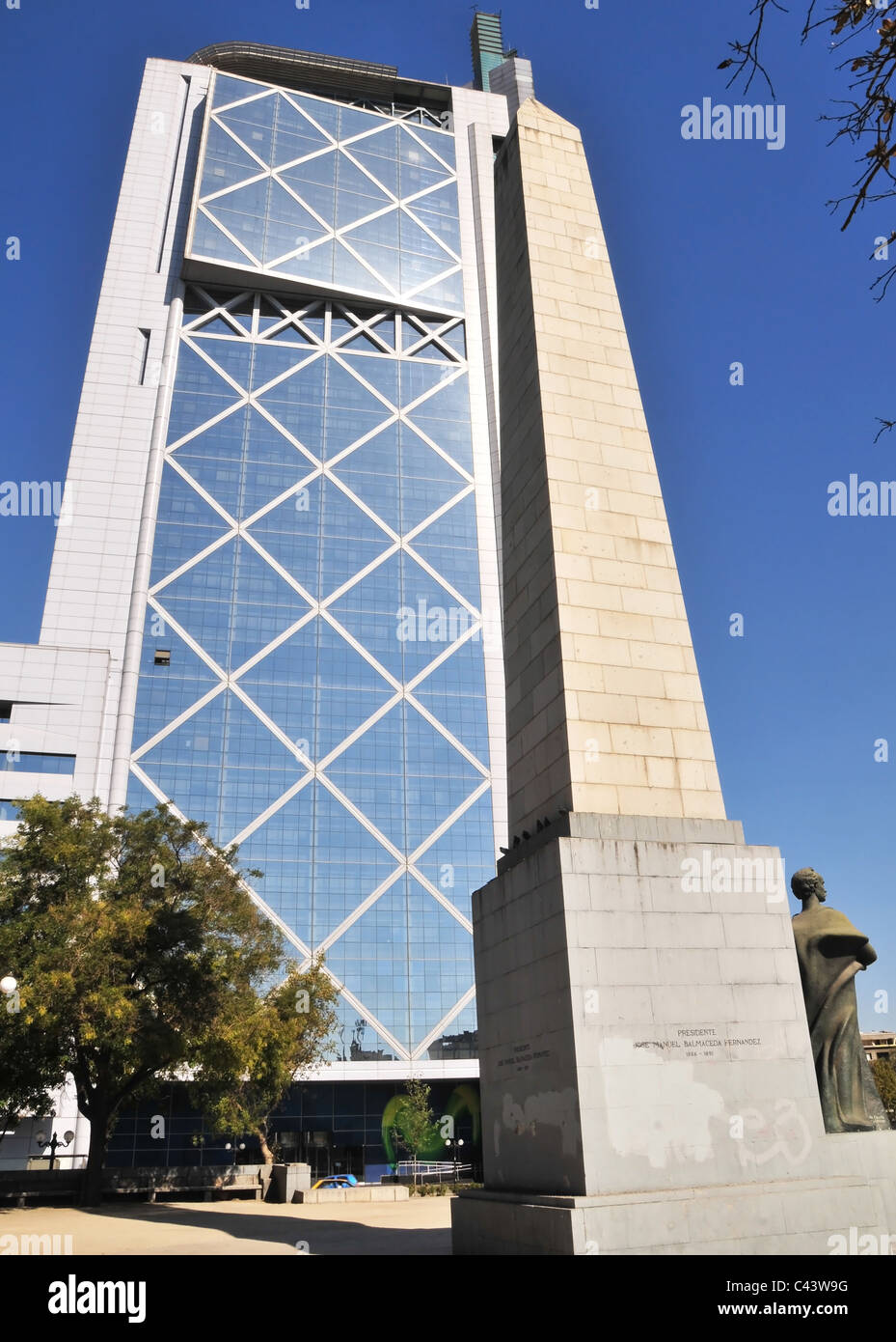 Blue sky profile President Balmaceda Monument obelisk, front of glass ...