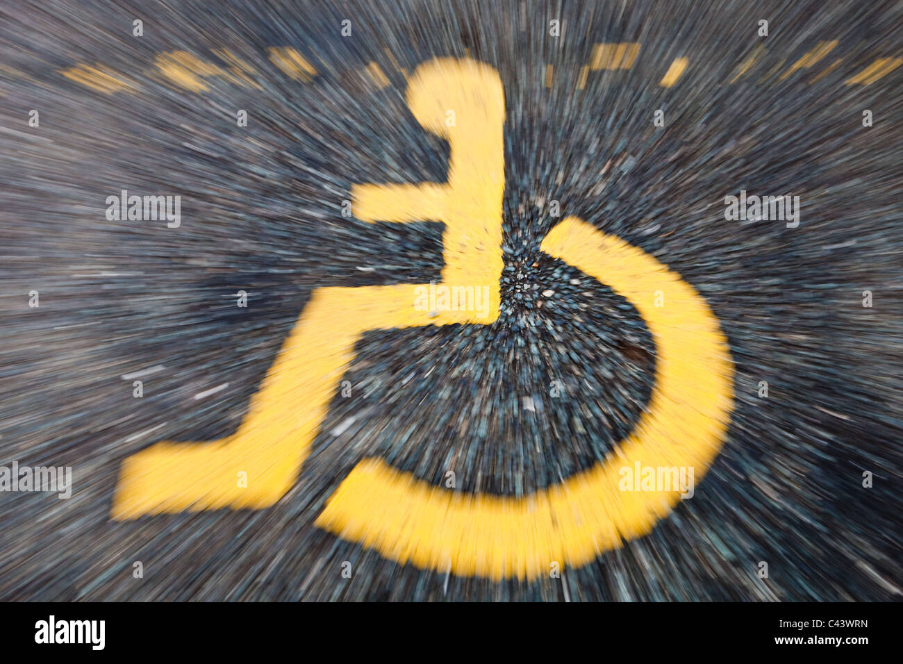 Yellow disabled sign with "burst effect"- centre of image is the only ...