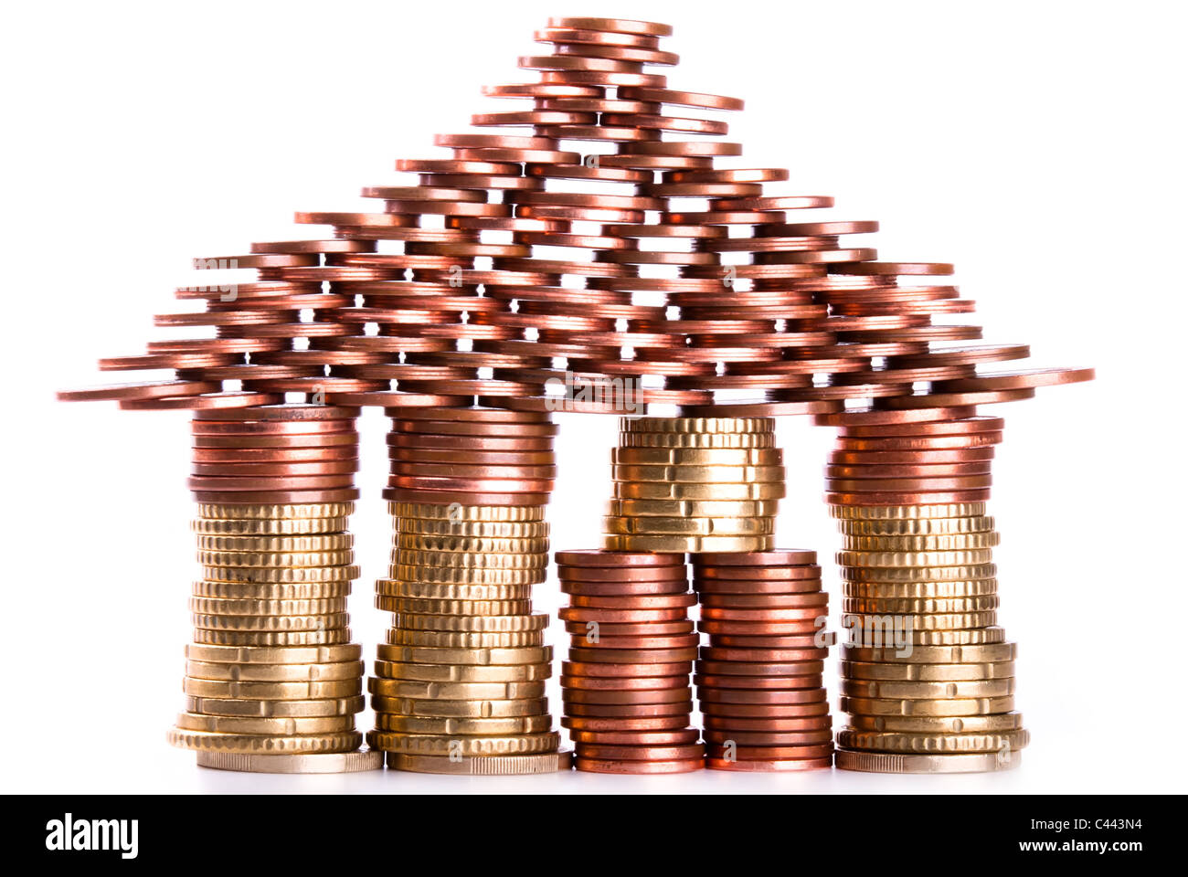 a house with door build of coins in front of white background Stock ...