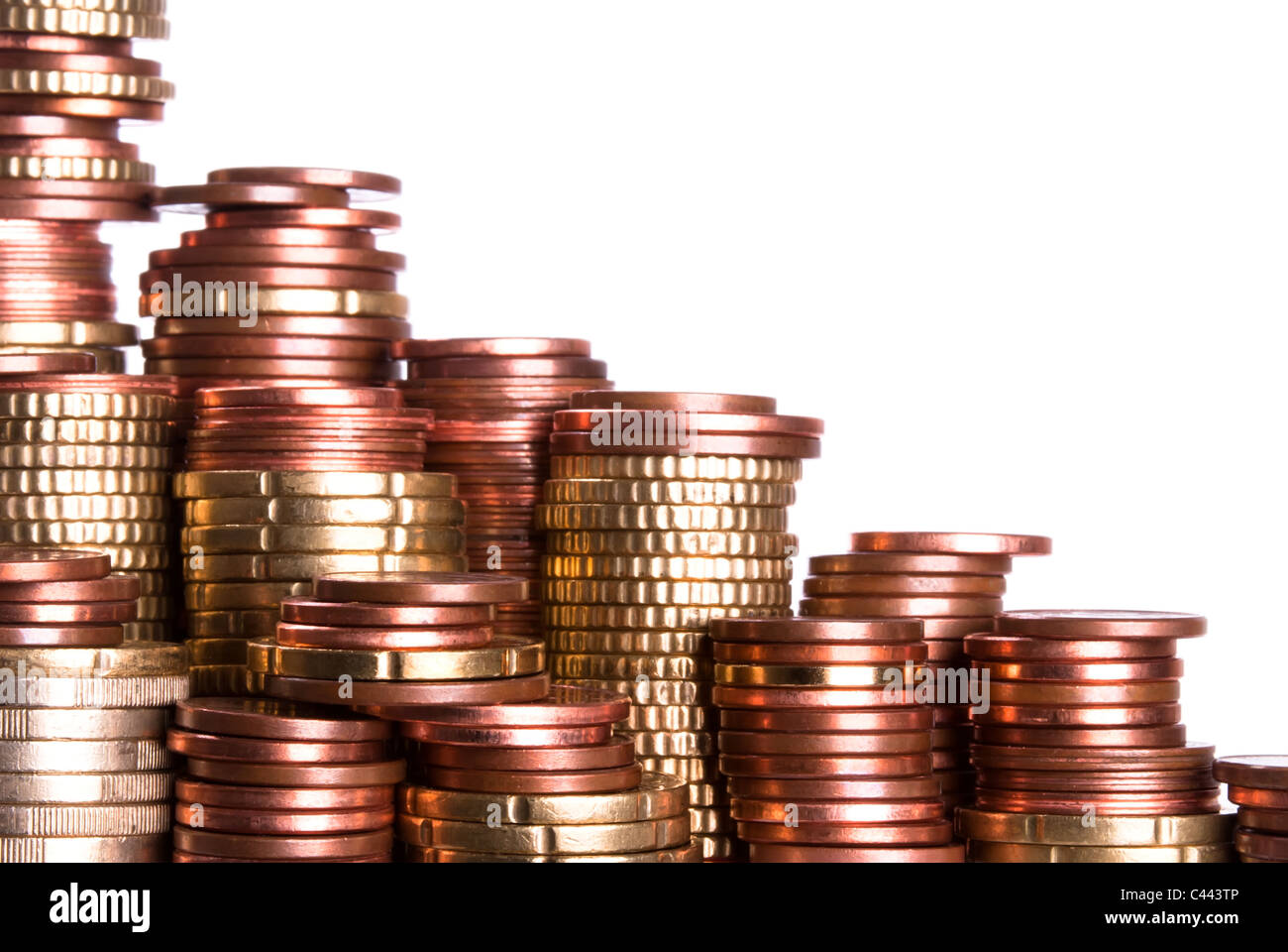 many coin piles of eurocoins stand side by side Stock Photo - Alamy