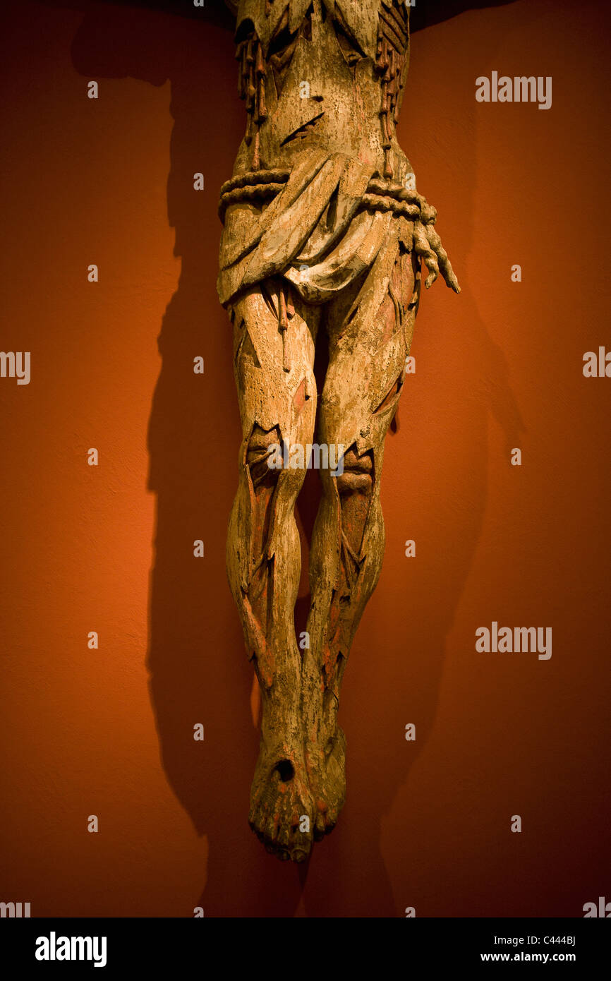 A crucifix statue, waist down Stock Photo - Alamy