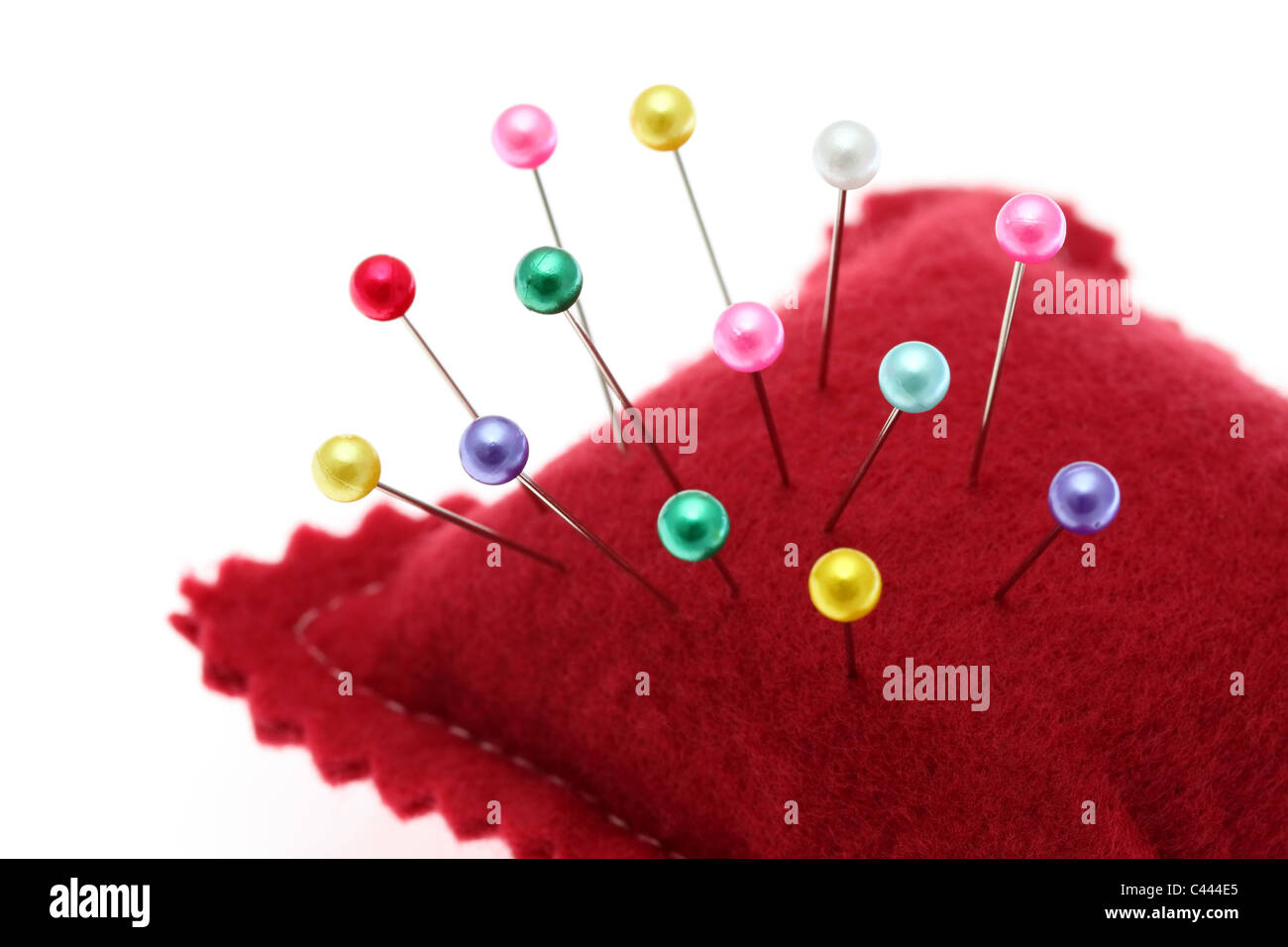 Sewing pins and pin cushion on a white Stock Photo - Alamy