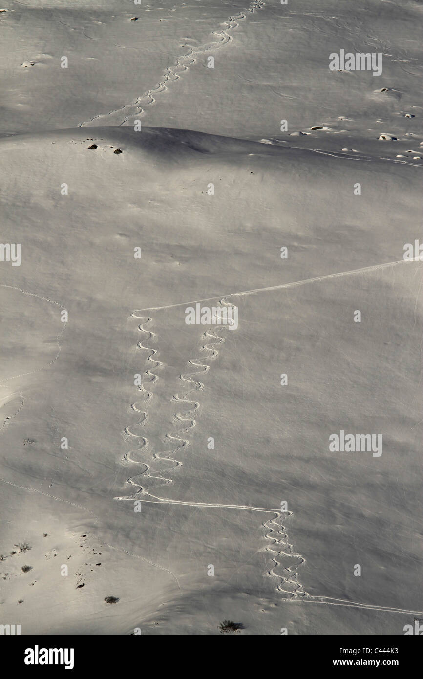 Ski tracks on mountain slope Stock Photo - Alamy