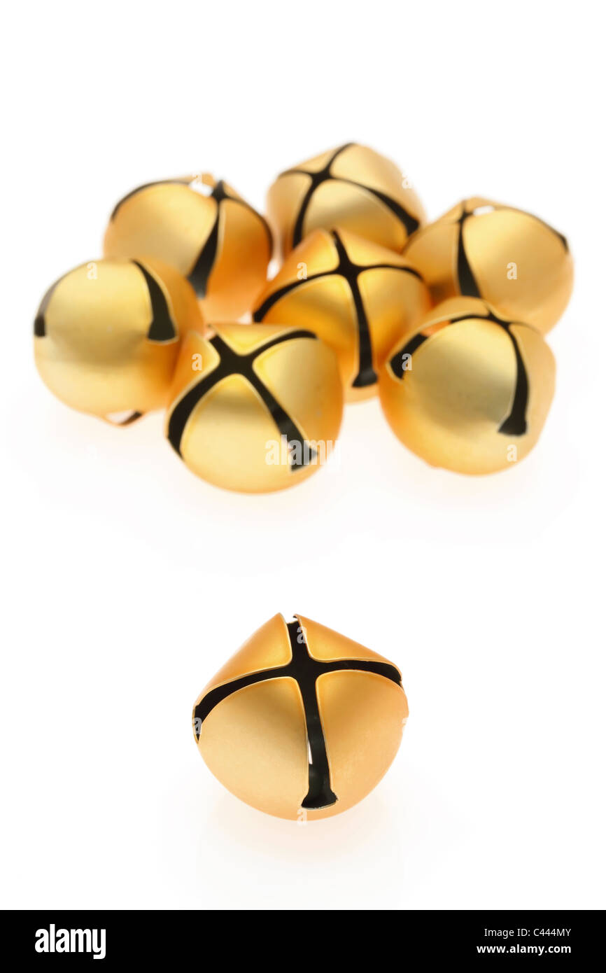 Golden bells isolated on white background Stock Photo - Alamy