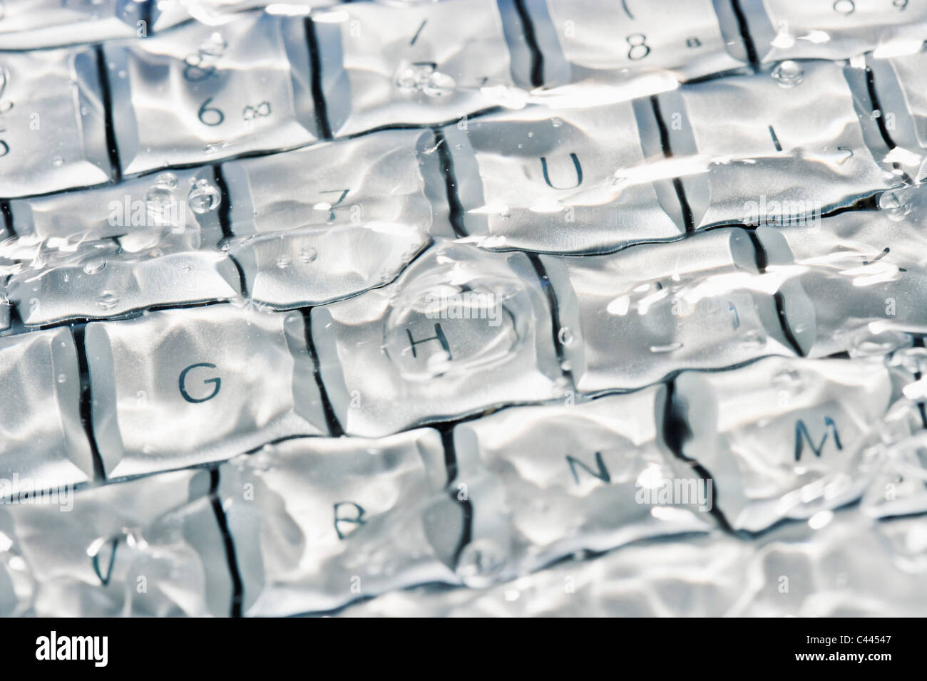 Detail of a computer keyboard underwater Stock Photo - Alamy