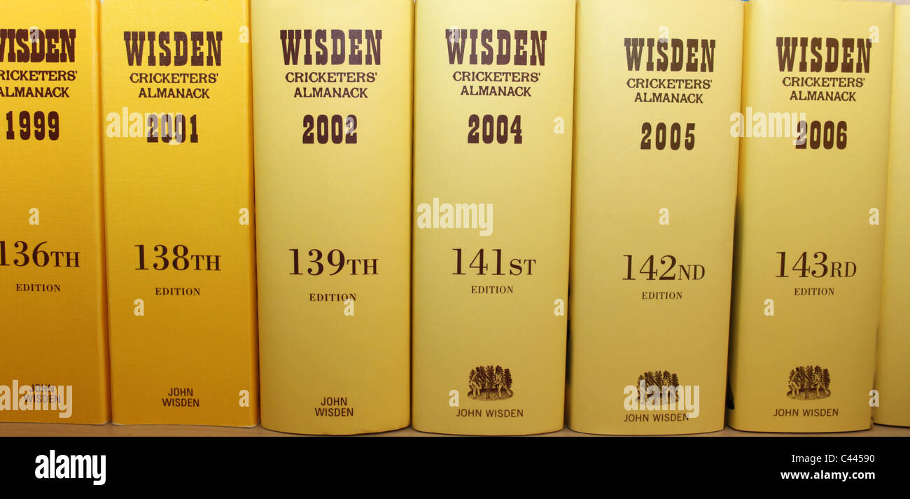 line up of 6 yellow wisden cricket books Stock Photo - Alamy