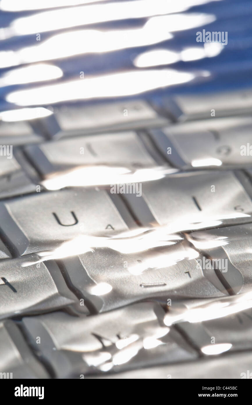 Detail of a computer keyboard underwater Stock Photo - Alamy