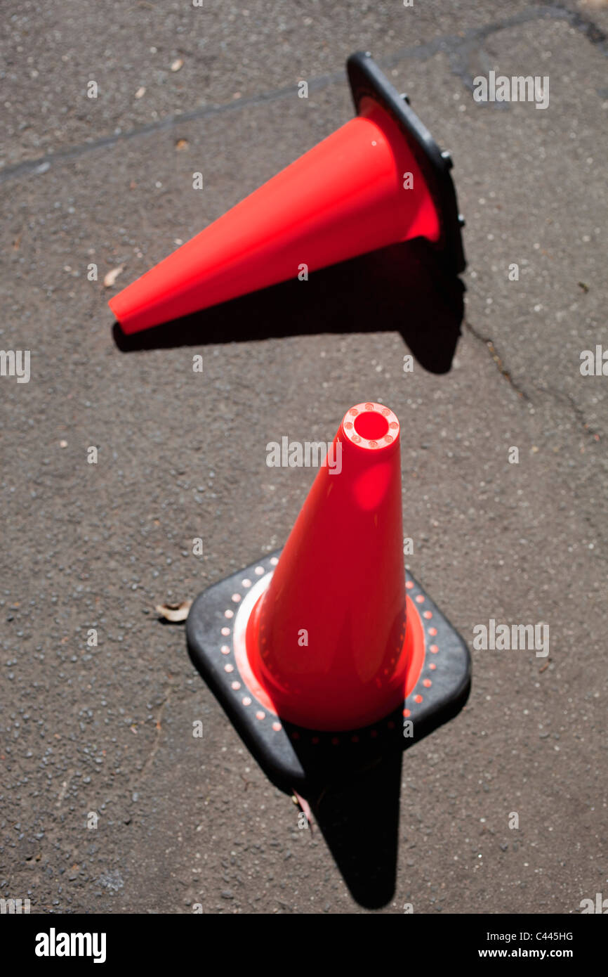 Two traffic cones on asphalt Stock Photo - Alamy