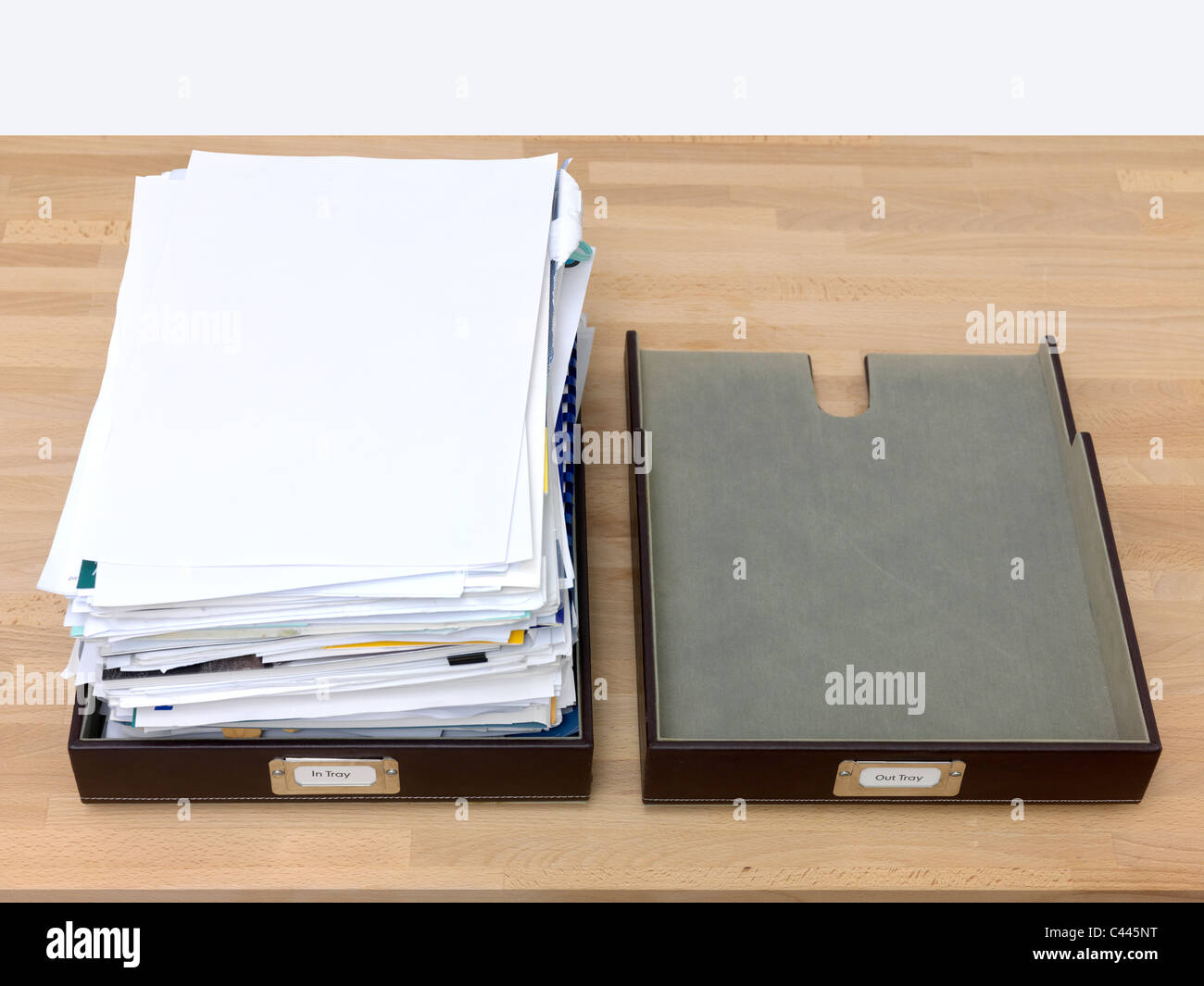 In and out office trays in an office situation Stock Photo - Alamy