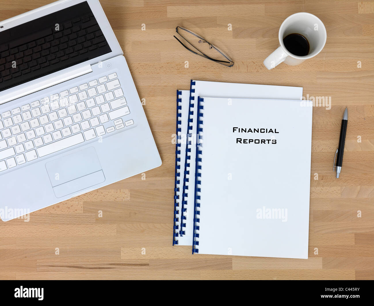 An office desk with office items in a work place scene Stock Photo - Alamy