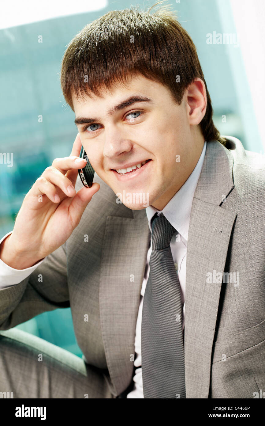 Portrait of handsome man calling by mobile phone Stock Photo - Alamy