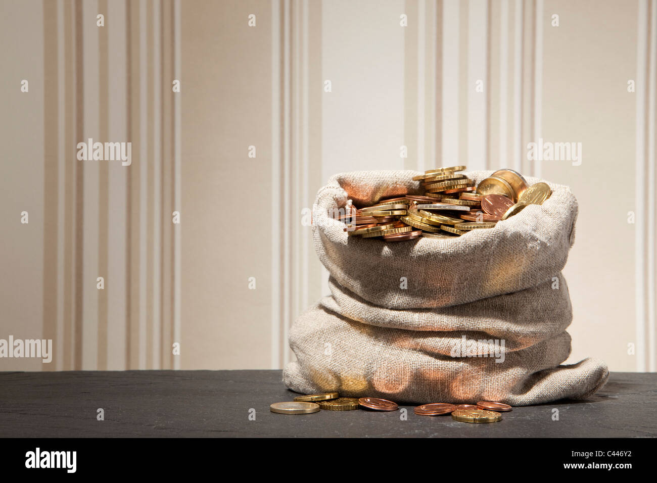 Sack of money overflowing hi-res stock photography and images - Alamy