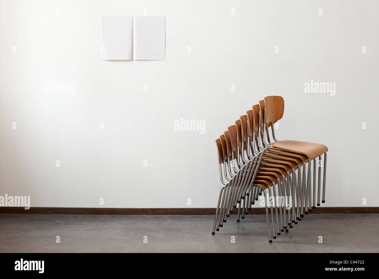 Stack of chairs Stock Photo - Alamy