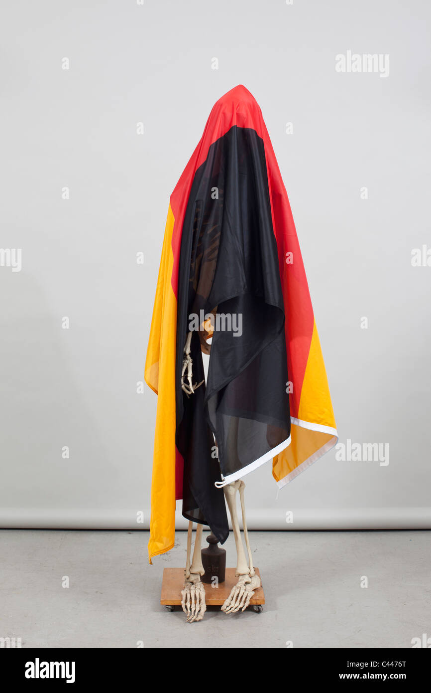 German flag draped over skeleton Stock Photo - Alamy