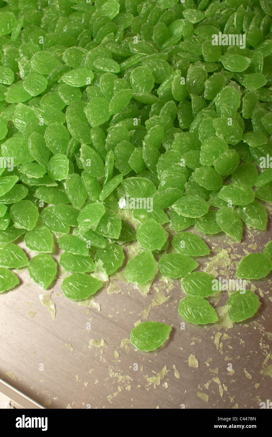 Lots of green candy Stock Photo - Alamy