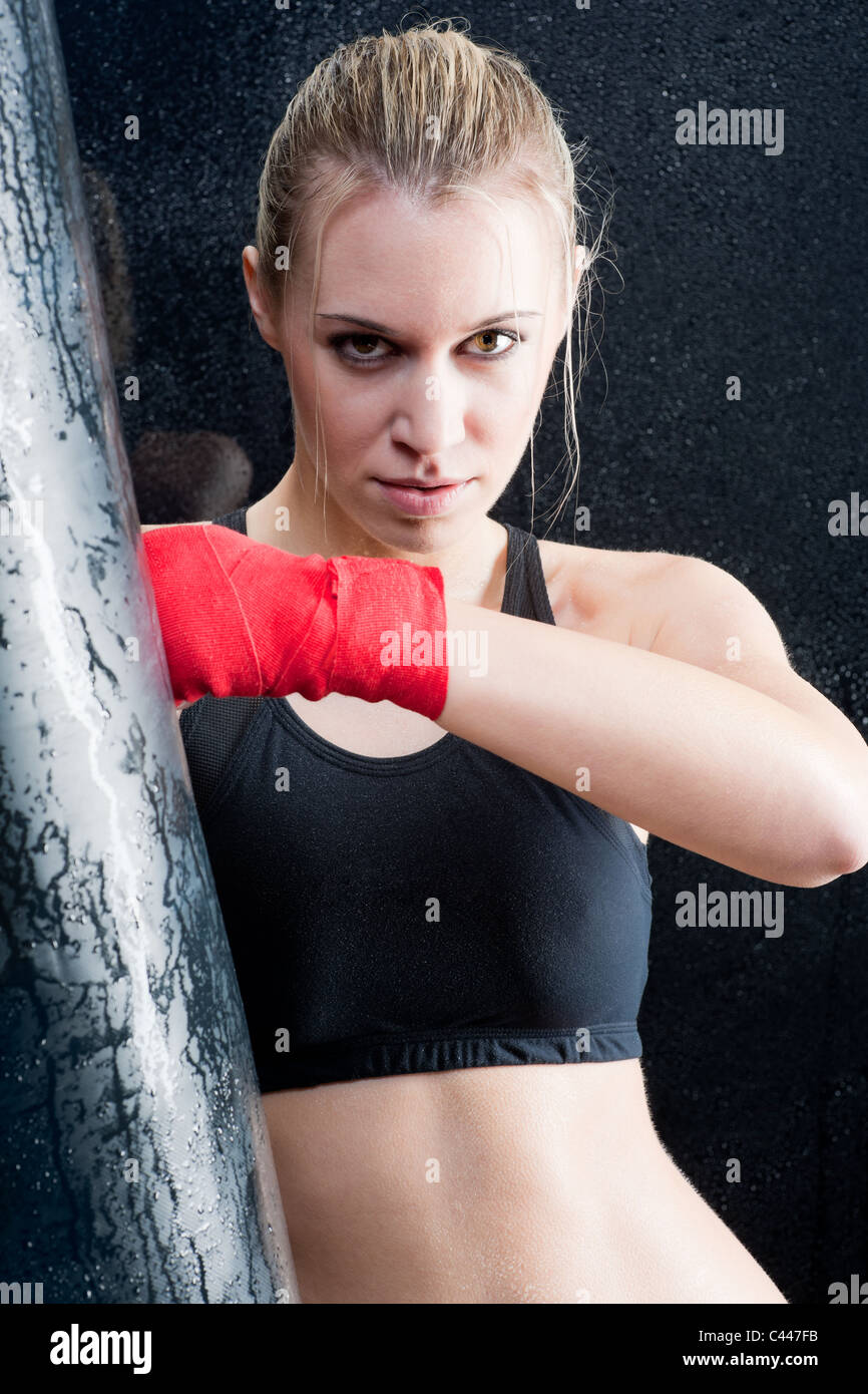 Boxing training blond woman sparring and sweating Stock Photo - Alamy