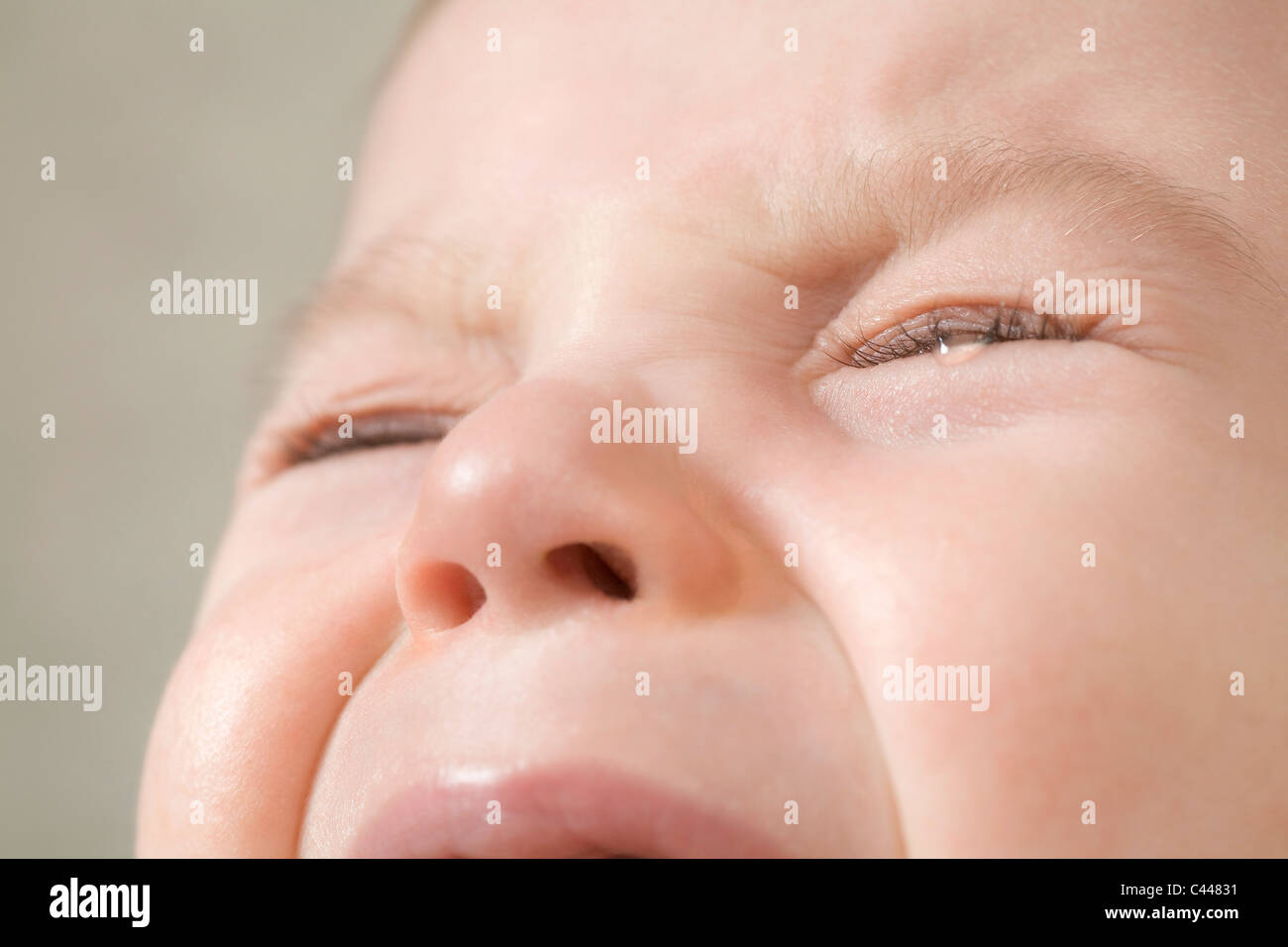 A baby boy crying, extreme close up of face Stock Photo - Alamy