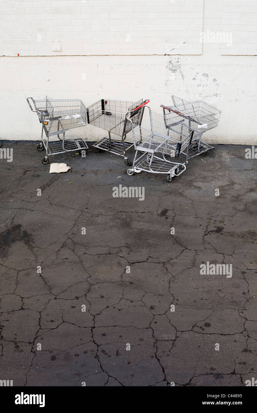 Abandoned shopping carts in a parking lot Stock Photo - Alamy