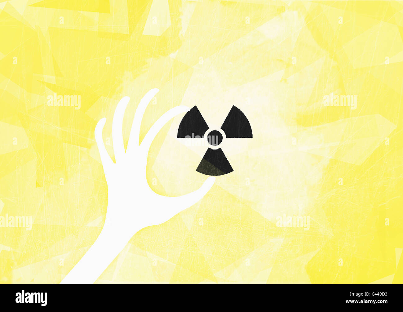 A hand holding a radioactive symbol Stock Photo - Alamy