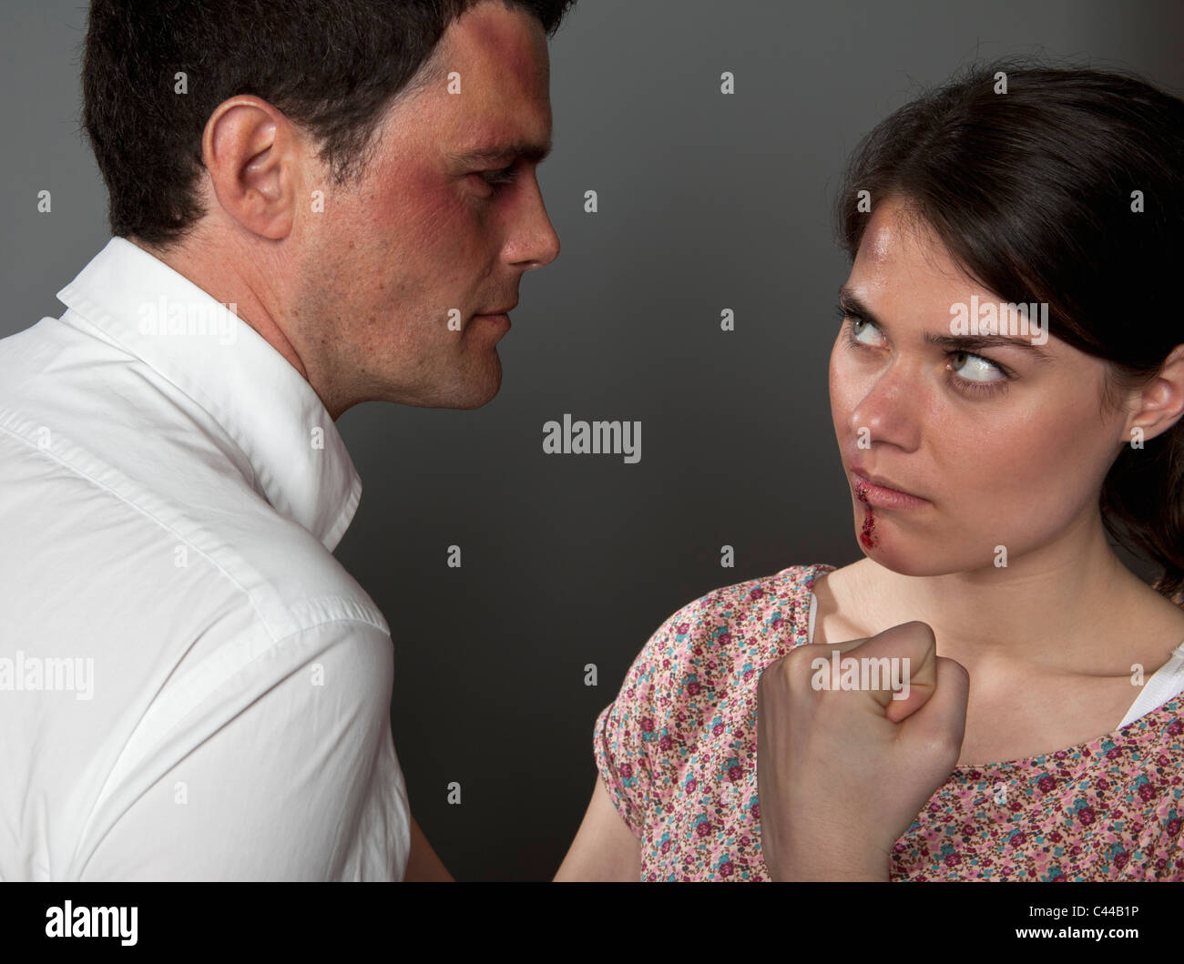 A woman and man fighting Stock Photo - Alamy