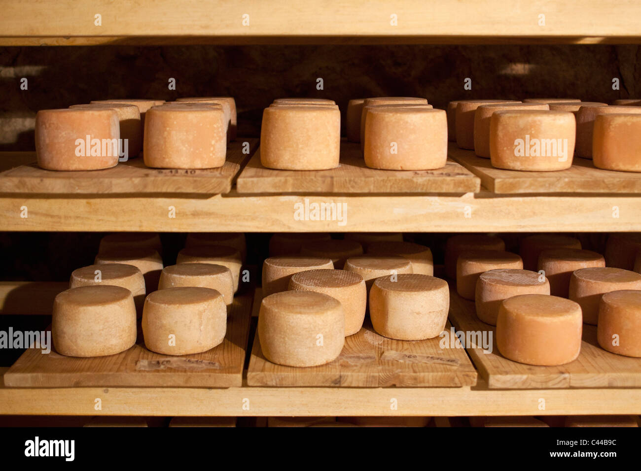 Large cheese wheels hi-res stock photography and images - Alamy