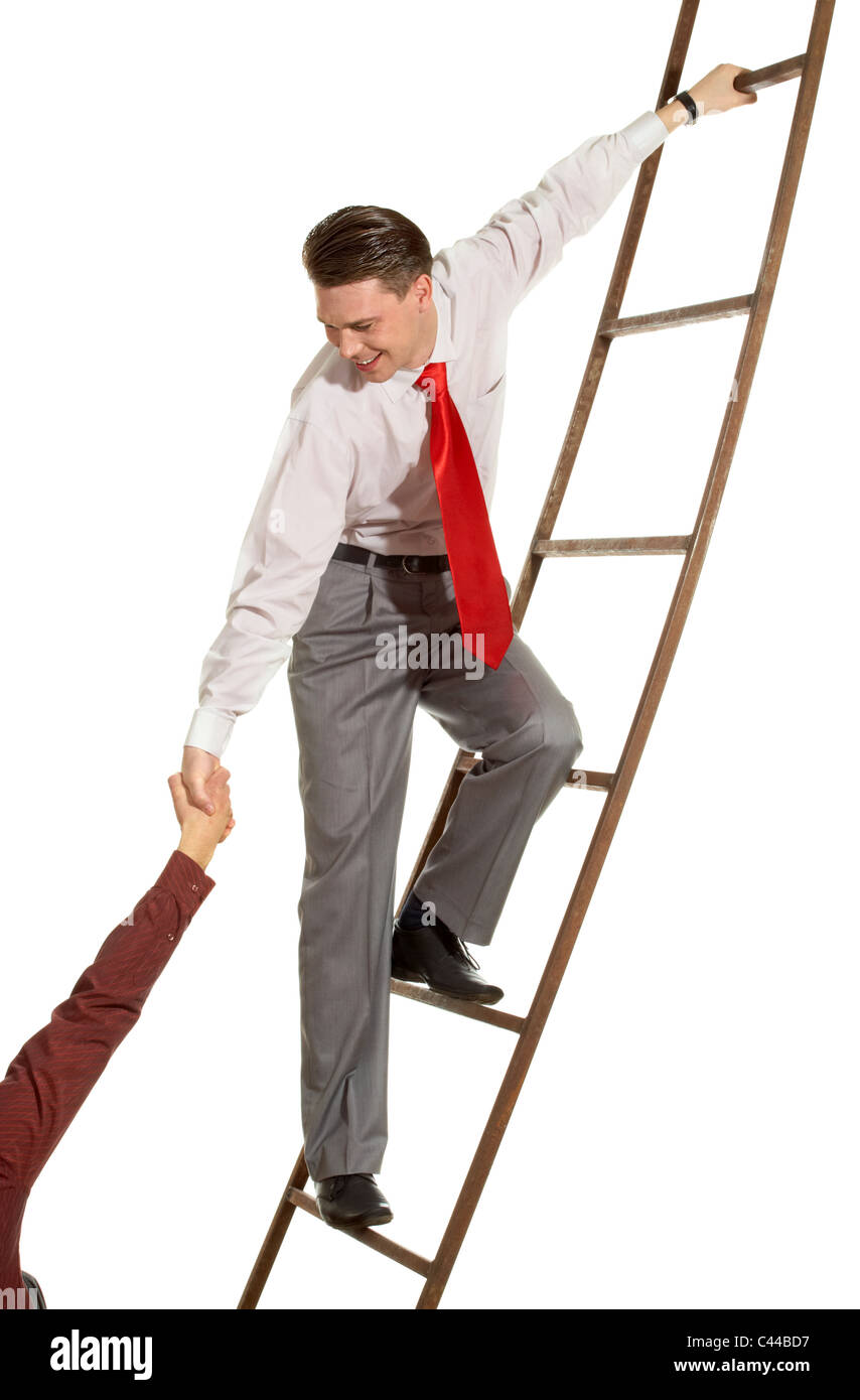 Image of confident businessman on ladder supporting man Stock Photo - Alamy