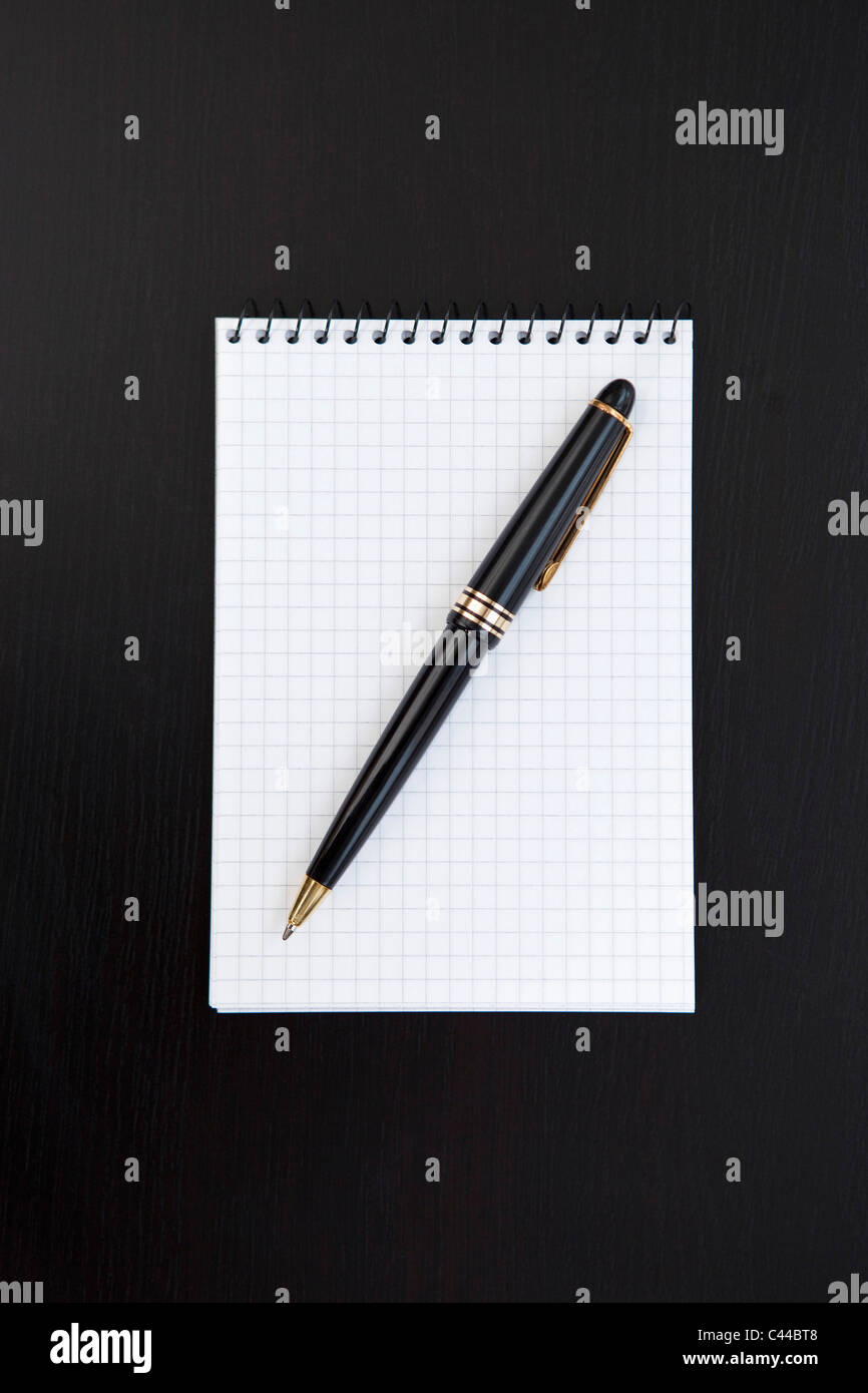 Pen and blank pad Stock Photo - Alamy