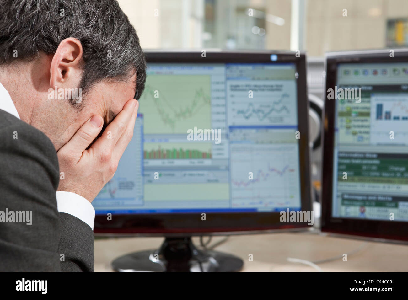 Businessman feels the finance pressure Stock Photo - Alamy